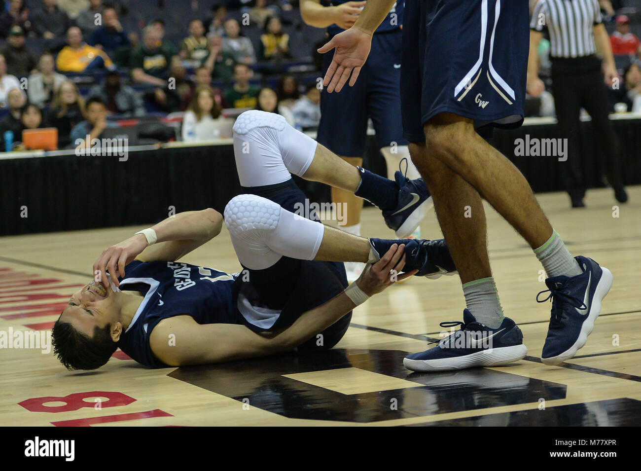 Washington, DC, USA. 8th Mar, 2018. YUTA WATANABE (12) grimaces in pain ...