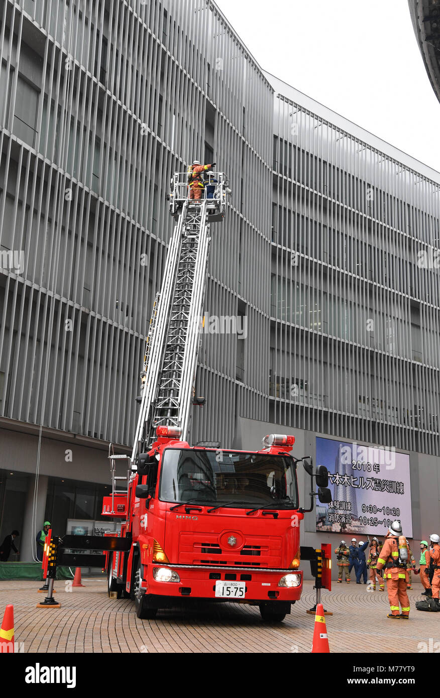 Tokyo, Japan. 9th Mar, 2018. Firefighters take part in a disaster drill ...