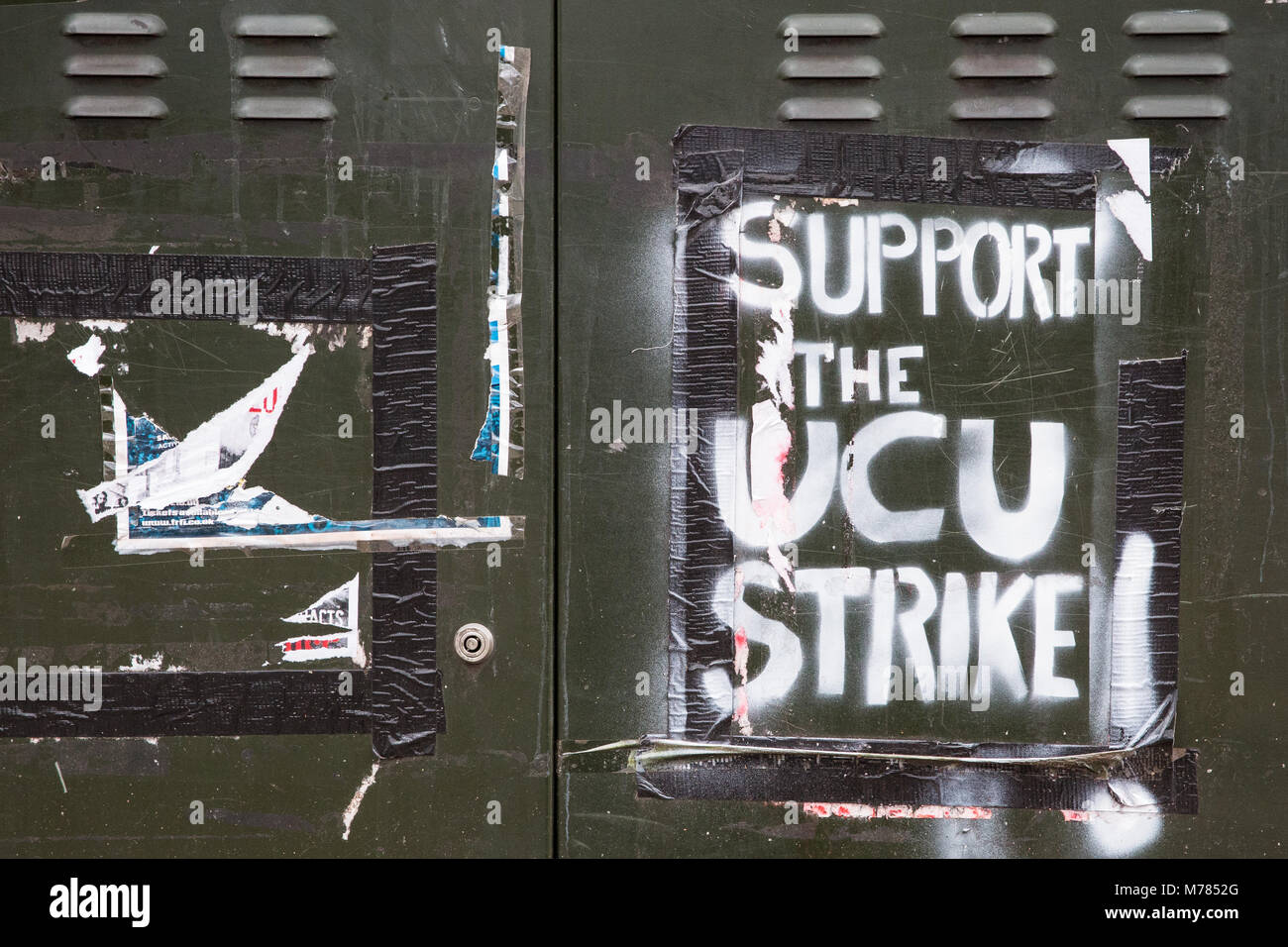 London, UK. 8th March, 2018. A stencil in support of the UCU strike ...