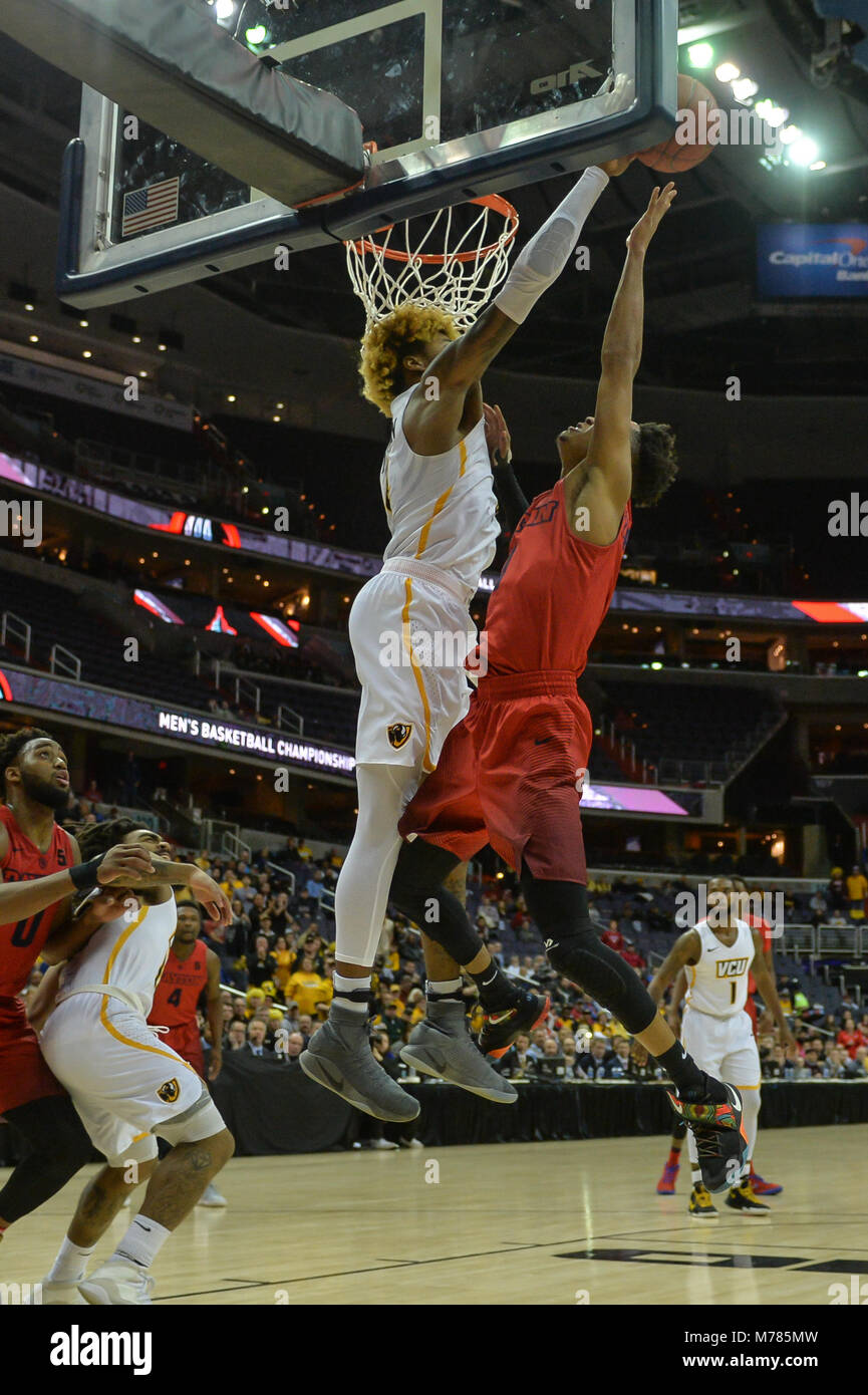Washington, DC, USA. 8th Mar, 2018. JUSTIN TILLMAN (4) blocks DARRELL ...