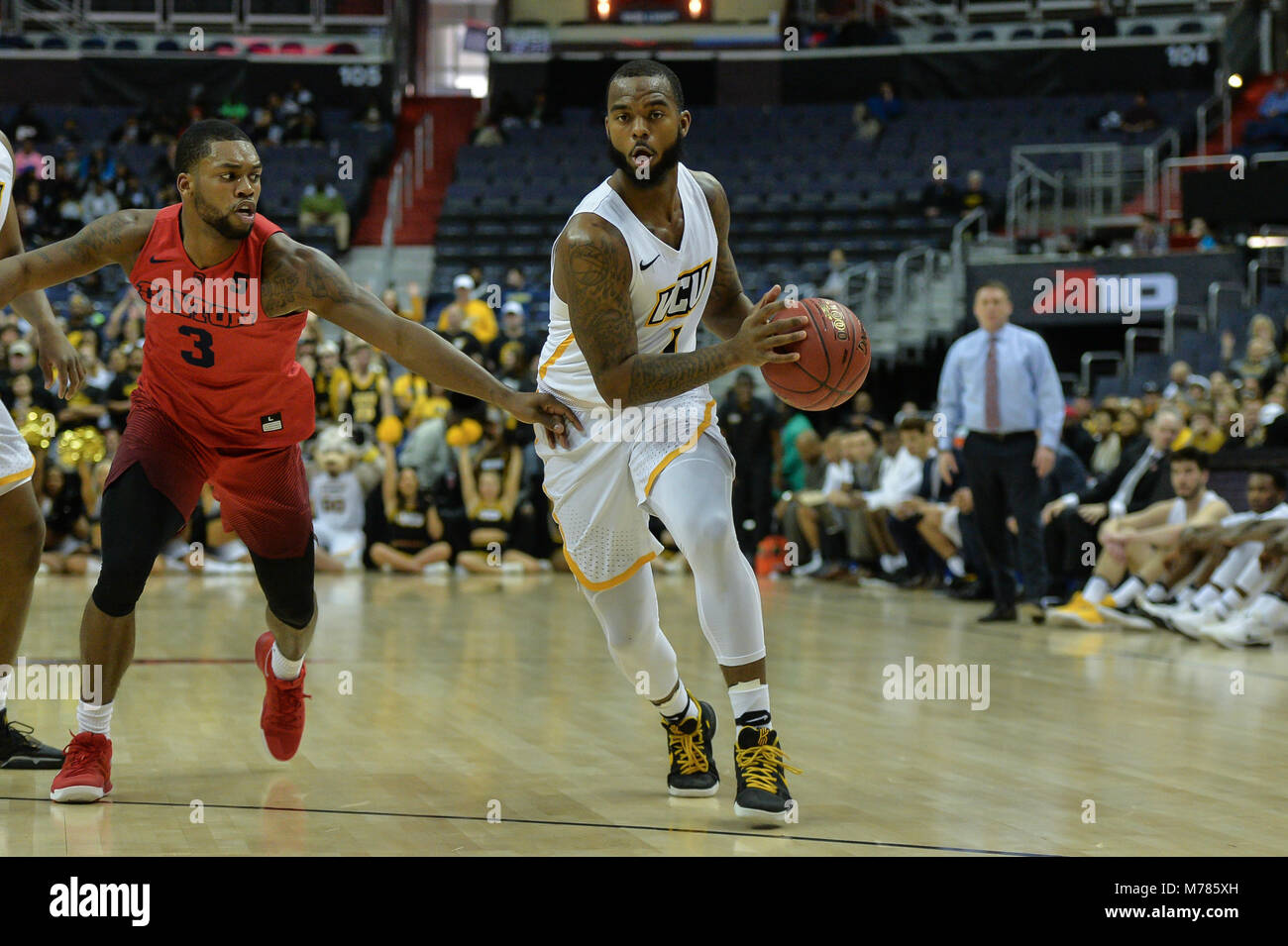 Washington, DC, USA. 8th Mar, 2018. MIKE'L SIMMS (1) dribbles passed ...