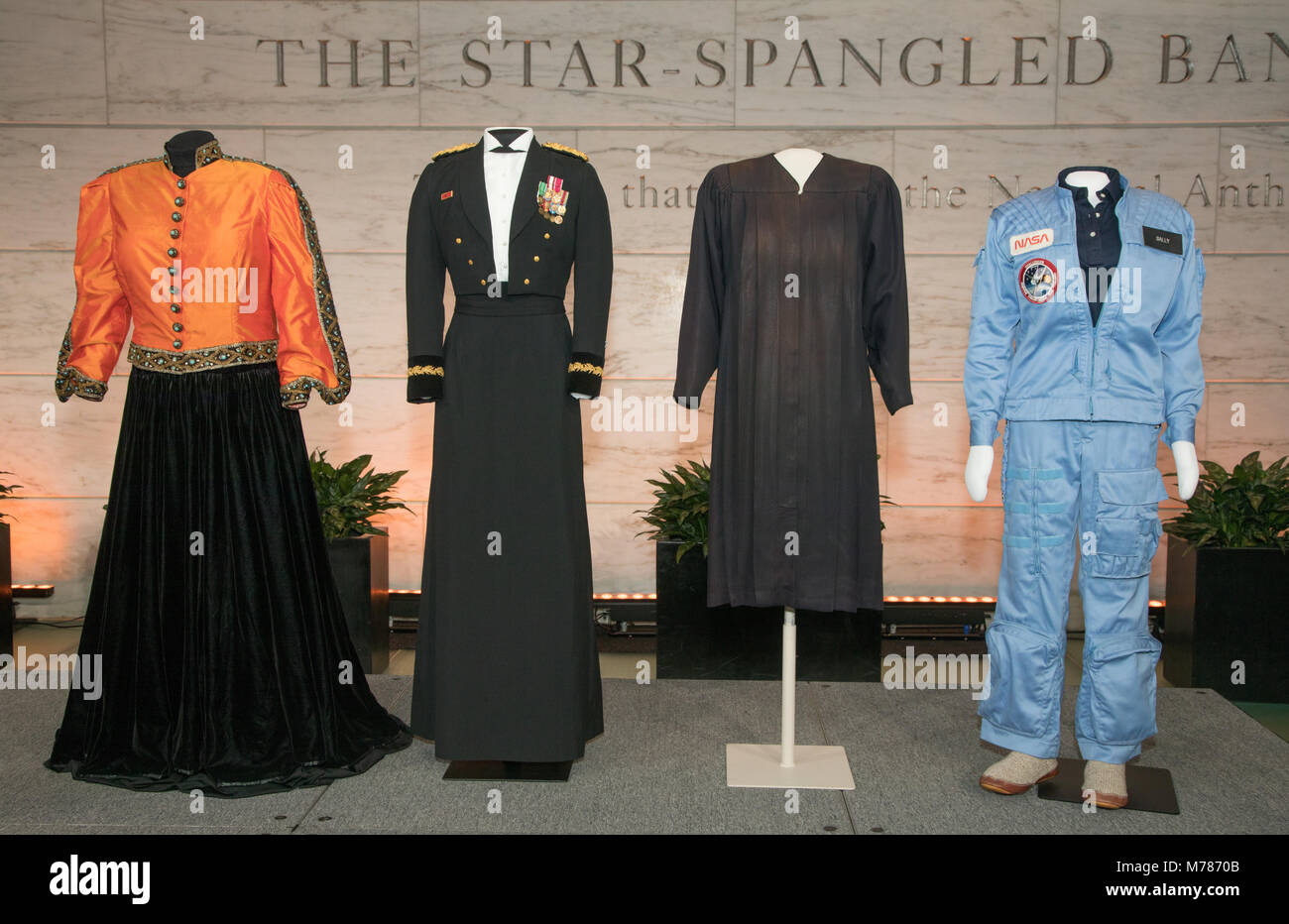 On display at the Smithsonian are outfits representing historic women ...