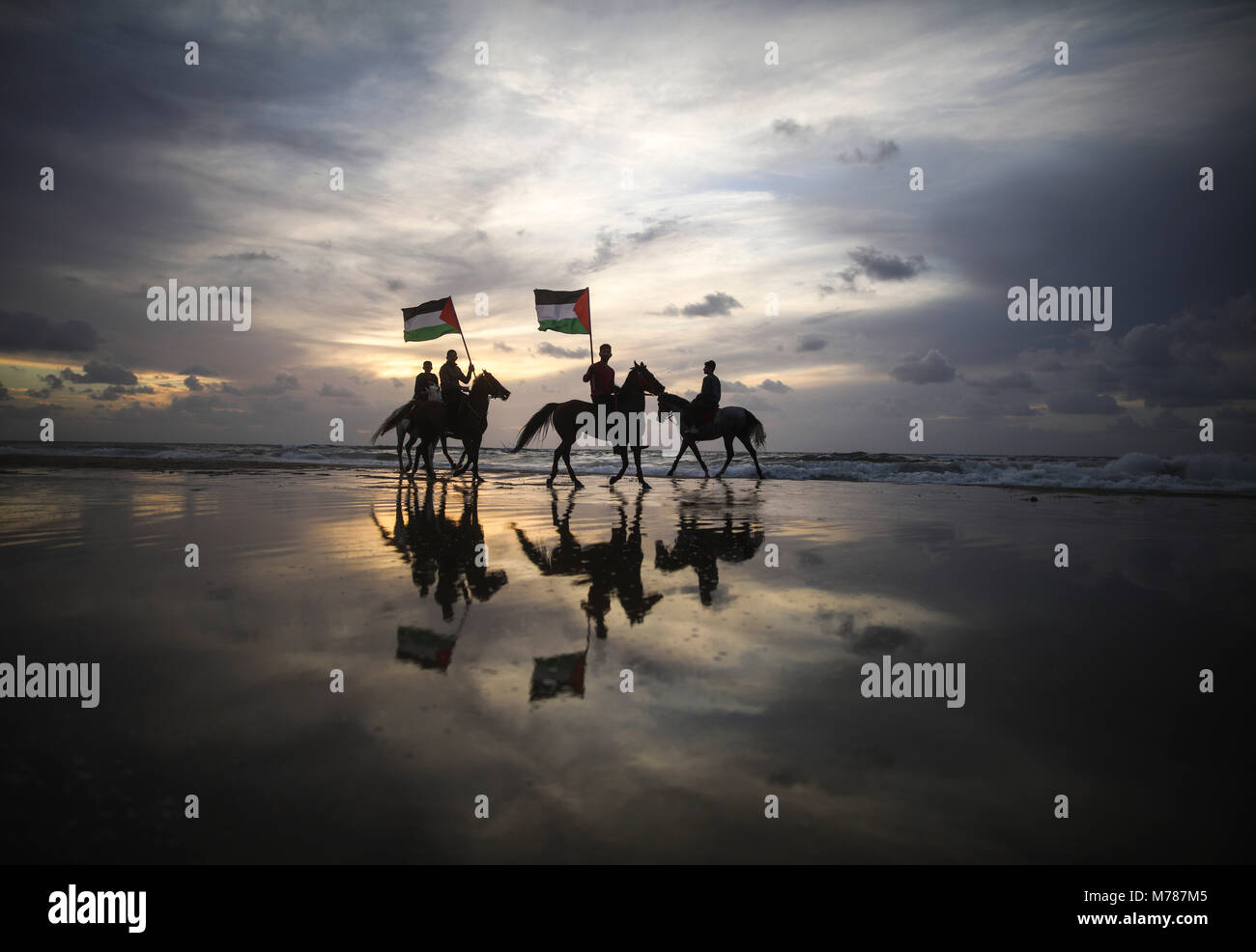 Gaza City, Gaza Strip. 09th Mar, 2018. Palestinians wave the national ...