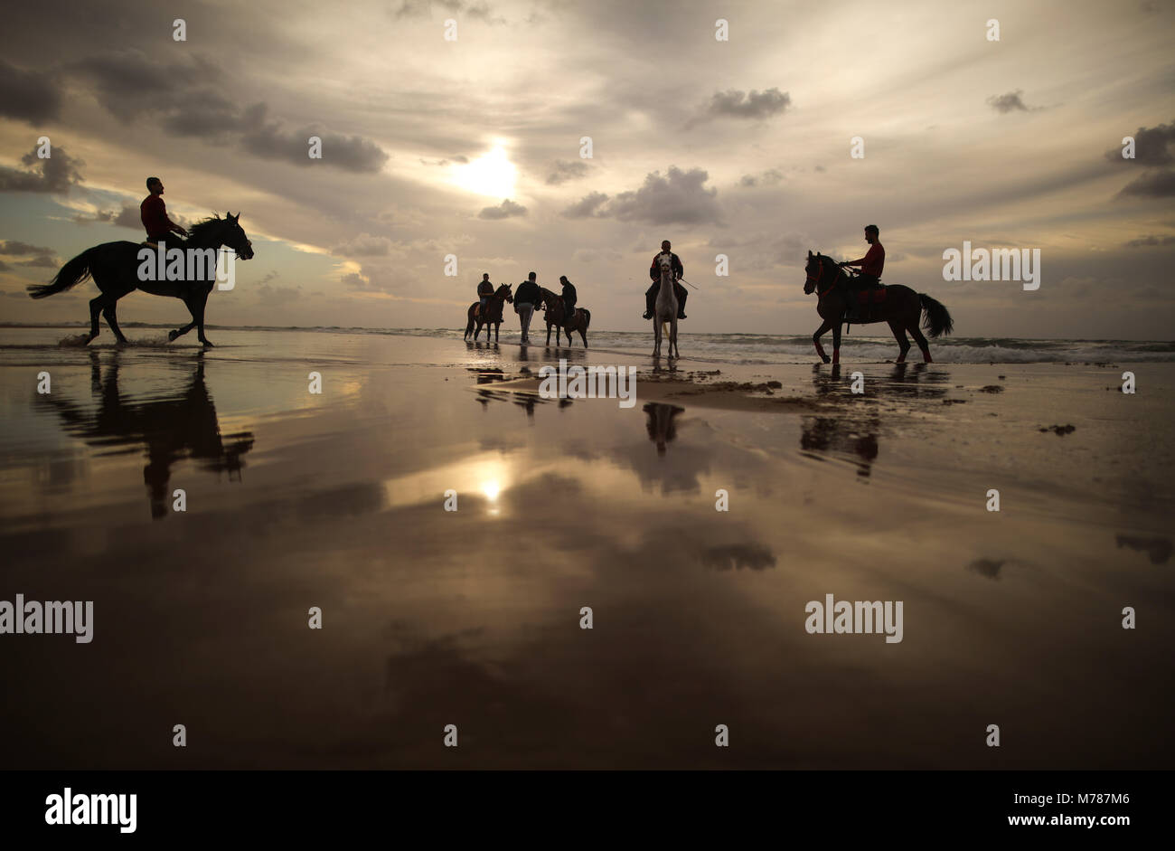 Gaza City, Gaza Strip. 09th Mar, 2018. Palestinians ride their horses ...