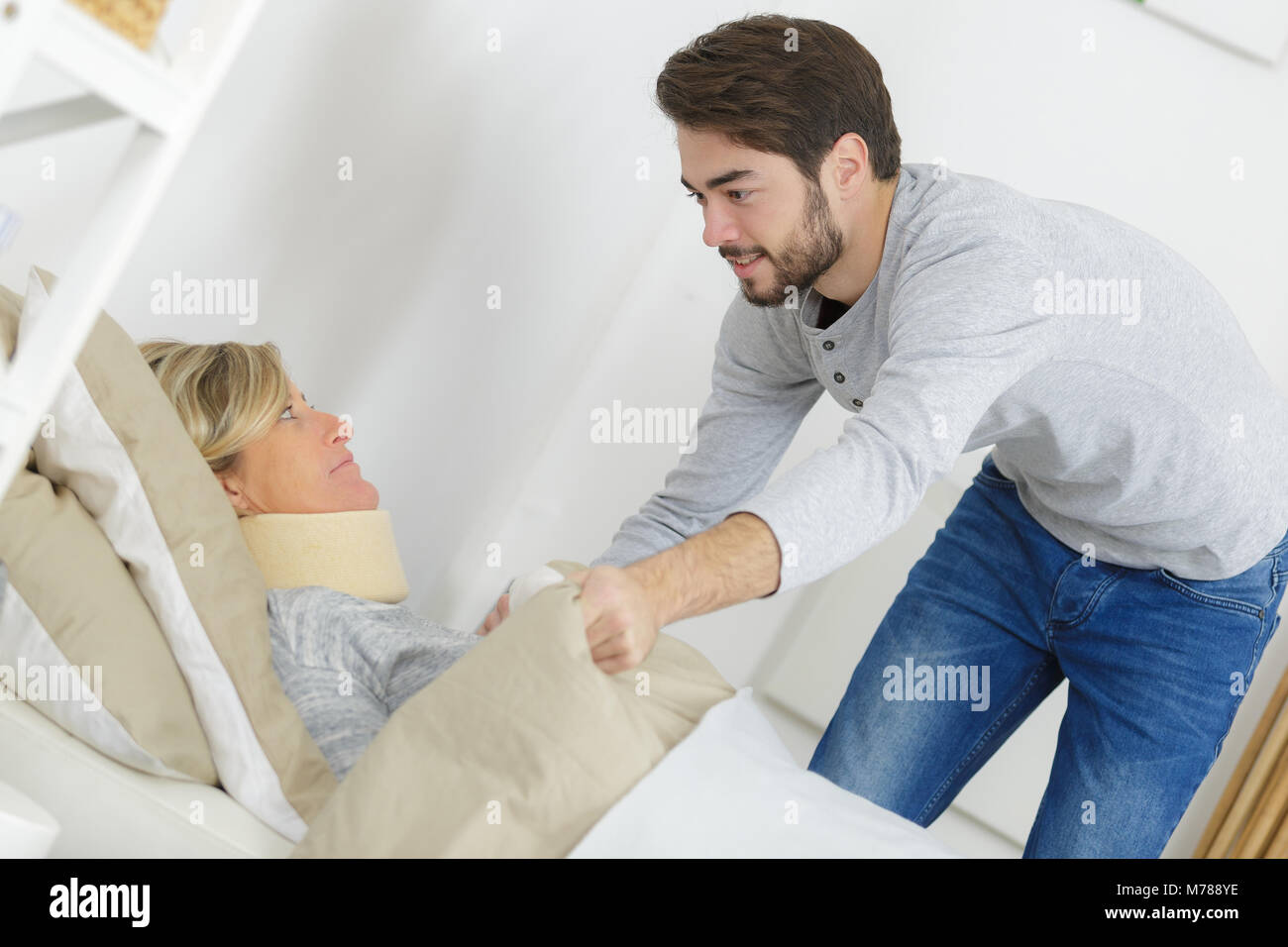 woman being assisted at home Stock Photo - Alamy