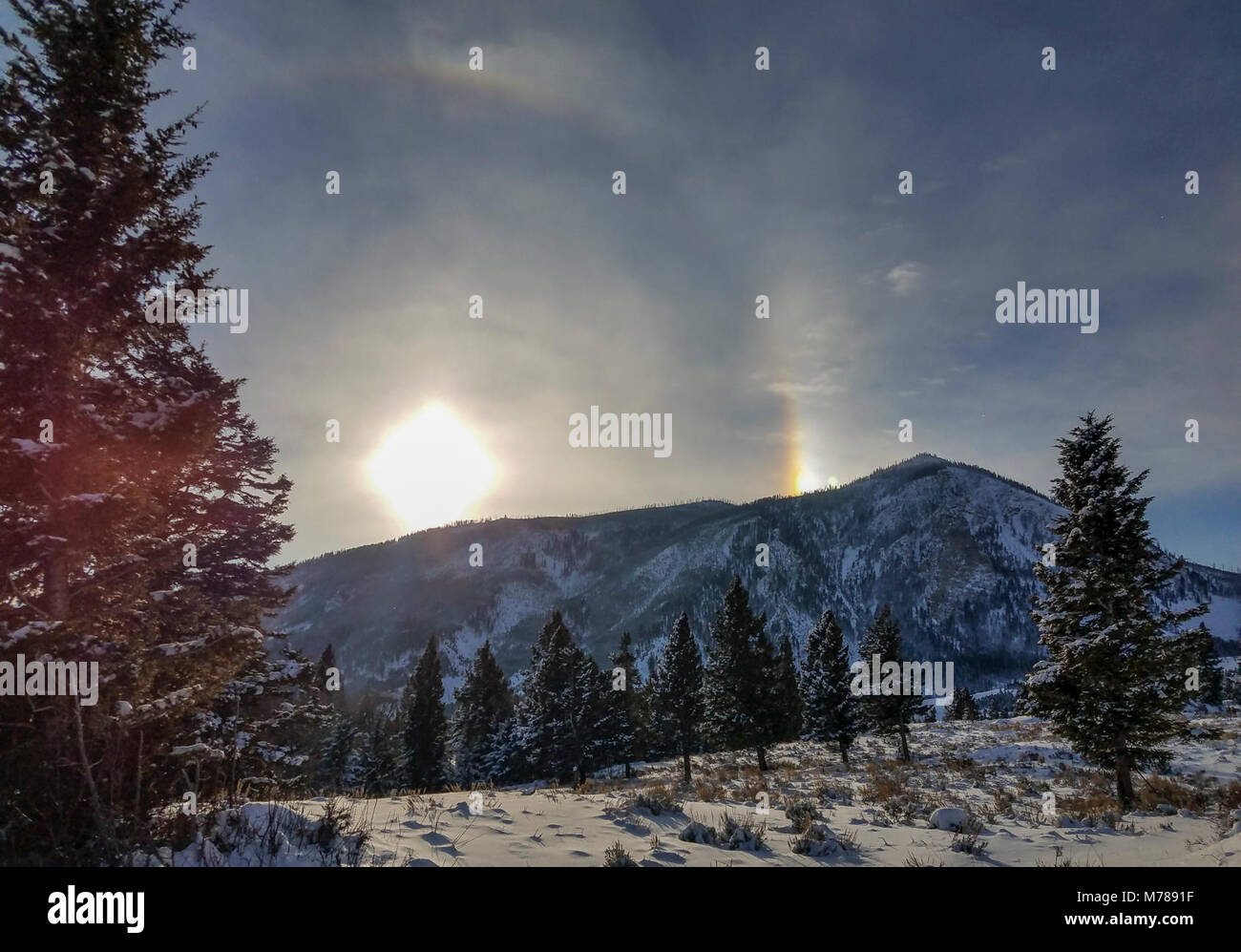 Bunsen Peak with 22 degree halo and sundog in background. 22 degree ...