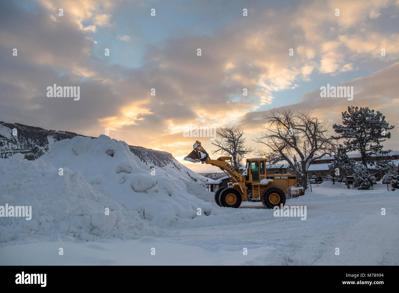 Clearing snow away in Mammoth with a front-end loader at Stock Photo ...