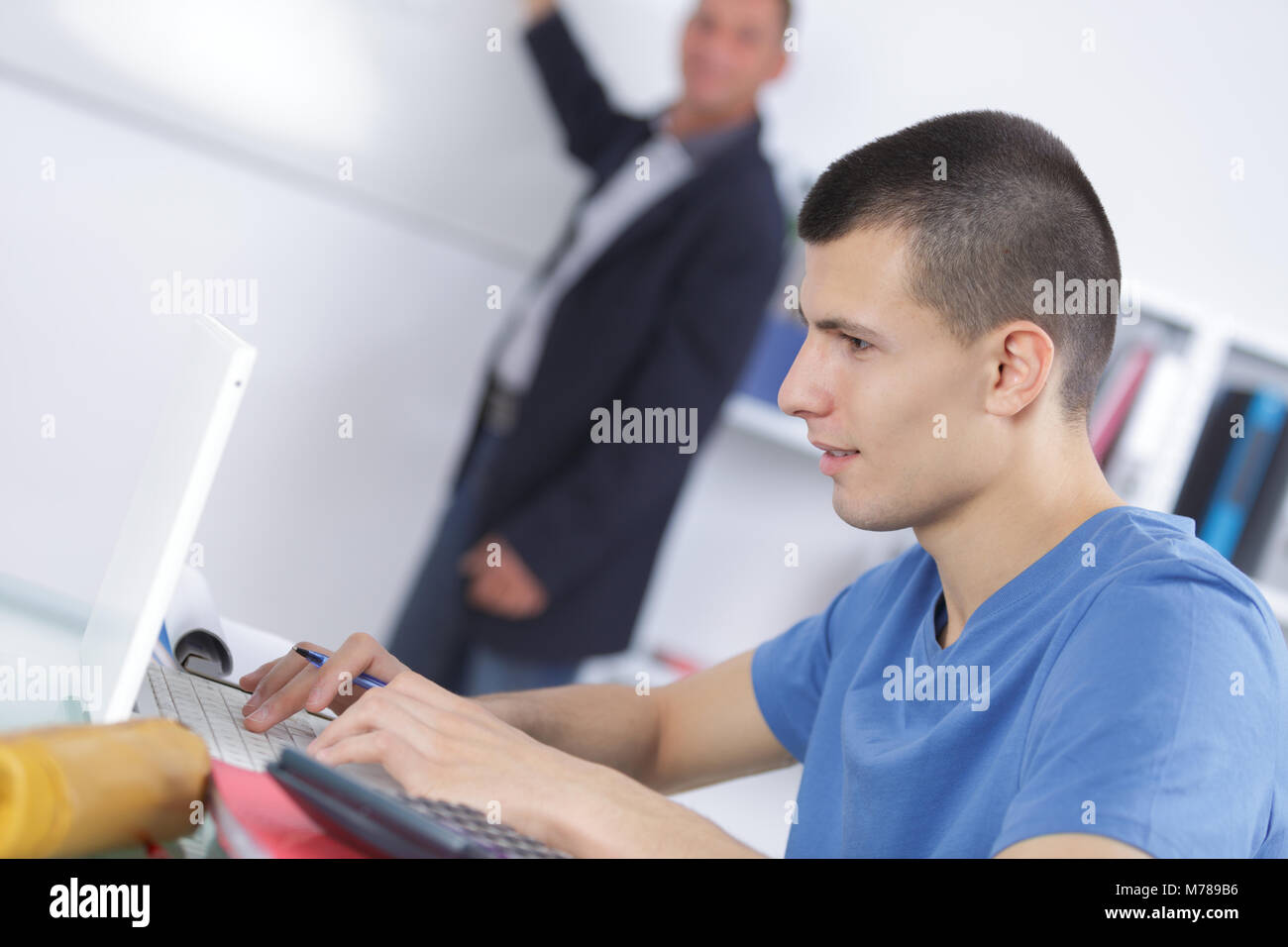 male student at computer class in college Stock Photo - Alamy