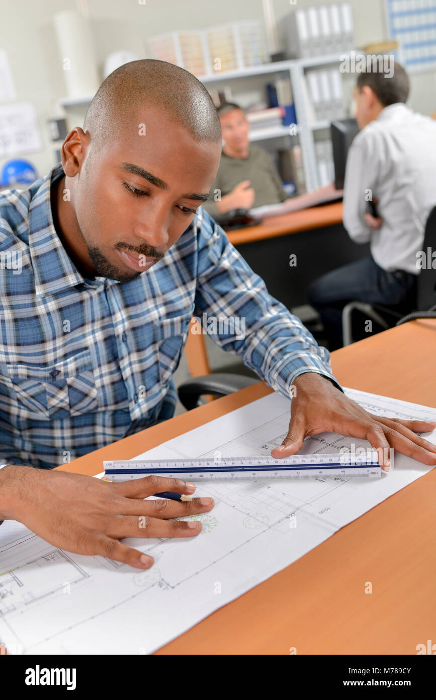 Architect using a ruler Stock Photo - Alamy