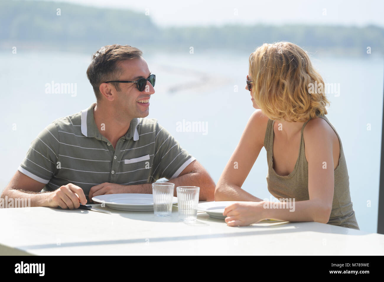 Romantic couple on lake glass hi-res stock photography and images - Alamy