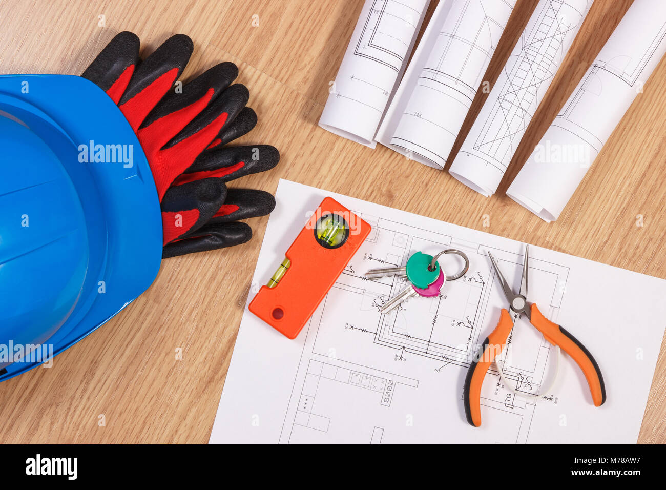 Home keys with blueprints or electrical construction drawings ...