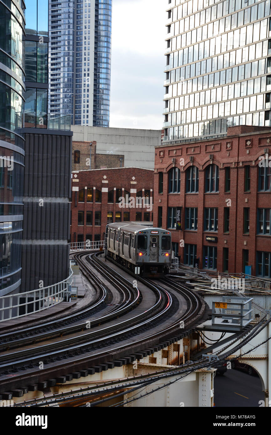 A Brown Line CTA train curves through the River North neighborhood on ...