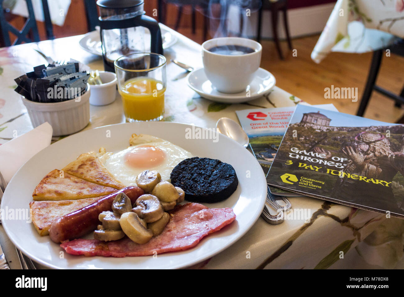 traditional irish breakfast with bacon, pudding, sausage, toast, egg ...
