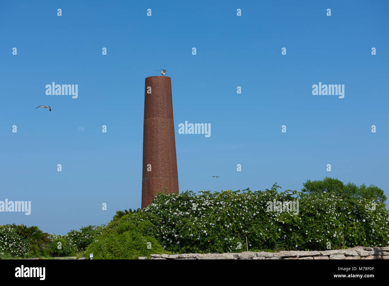 A Water feature with Trickling Water running down its sides, cools off ...