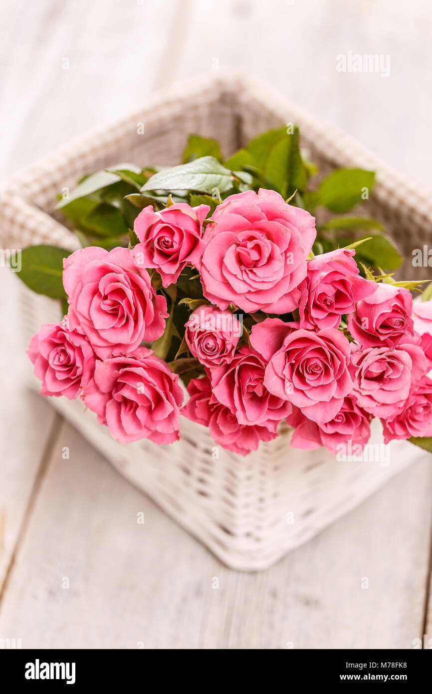 Rose on basket hi-res stock photography and images - Alamy