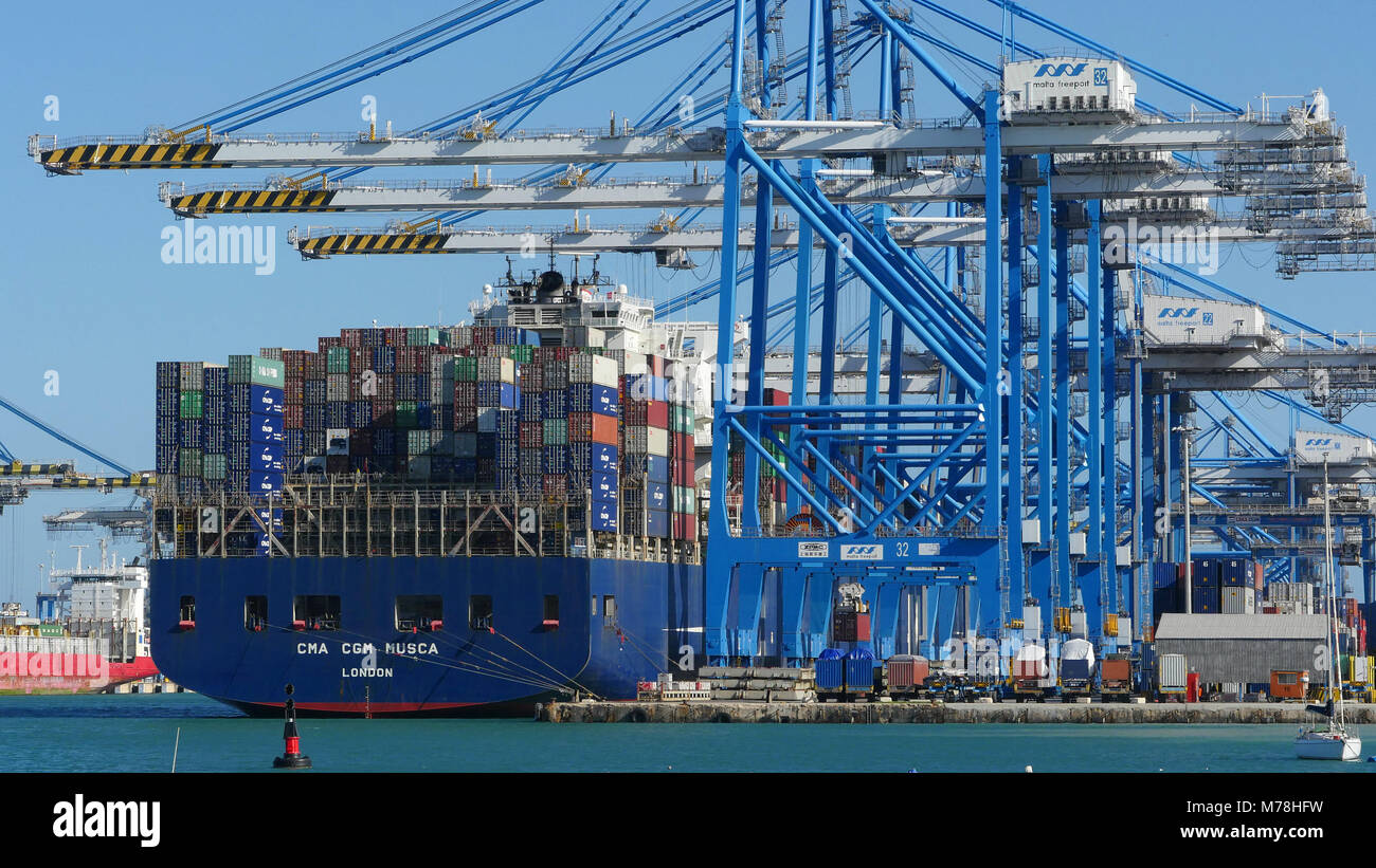 Container vessels being loaded. The container port in Malta. Malta ...