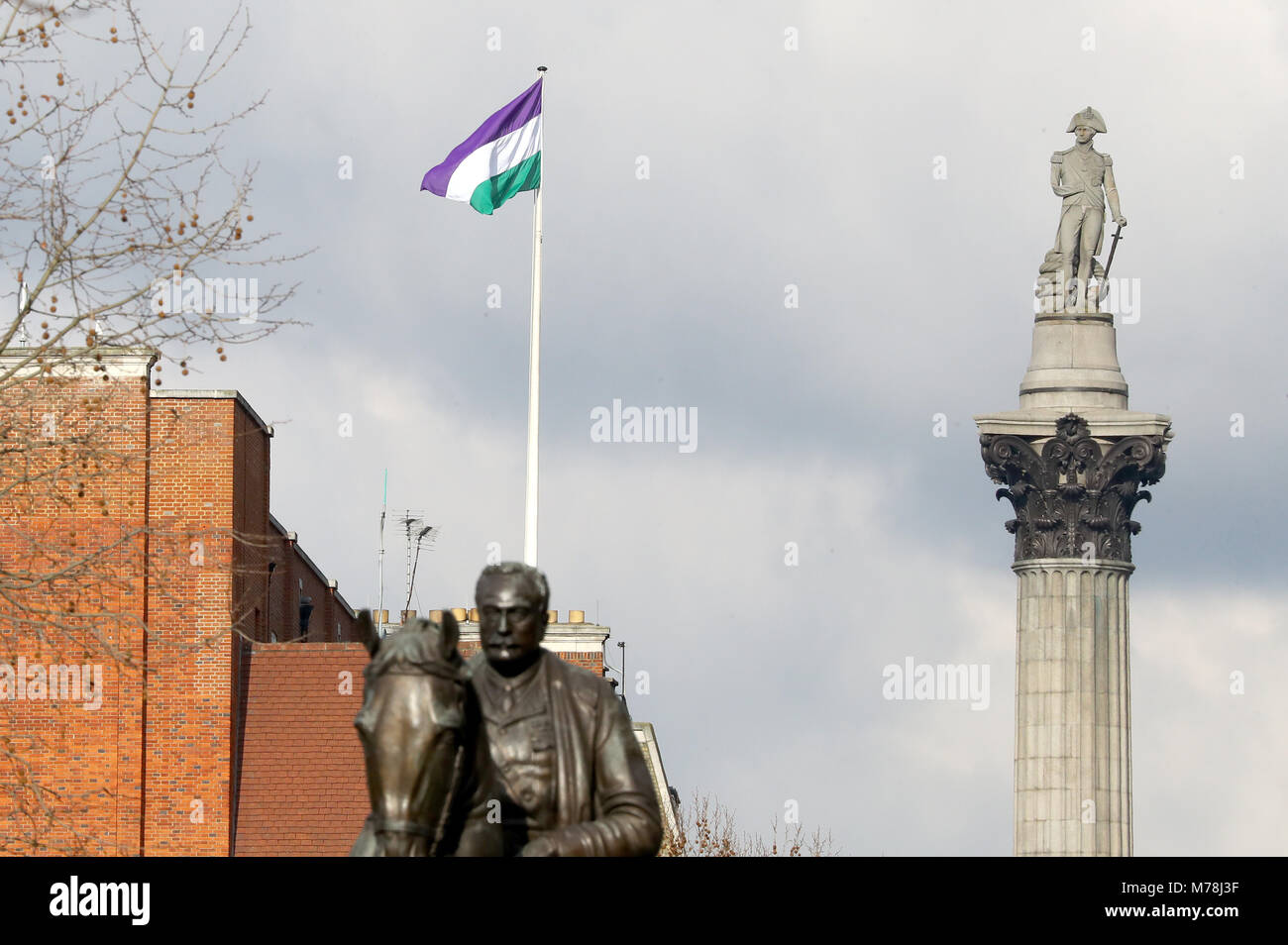 Suffragette flag flying above Whitehall, London, 100 years after the ...