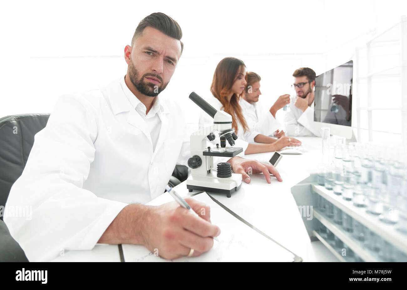 young scientist works in the lab.concept of teamwork Stock Photo - Alamy