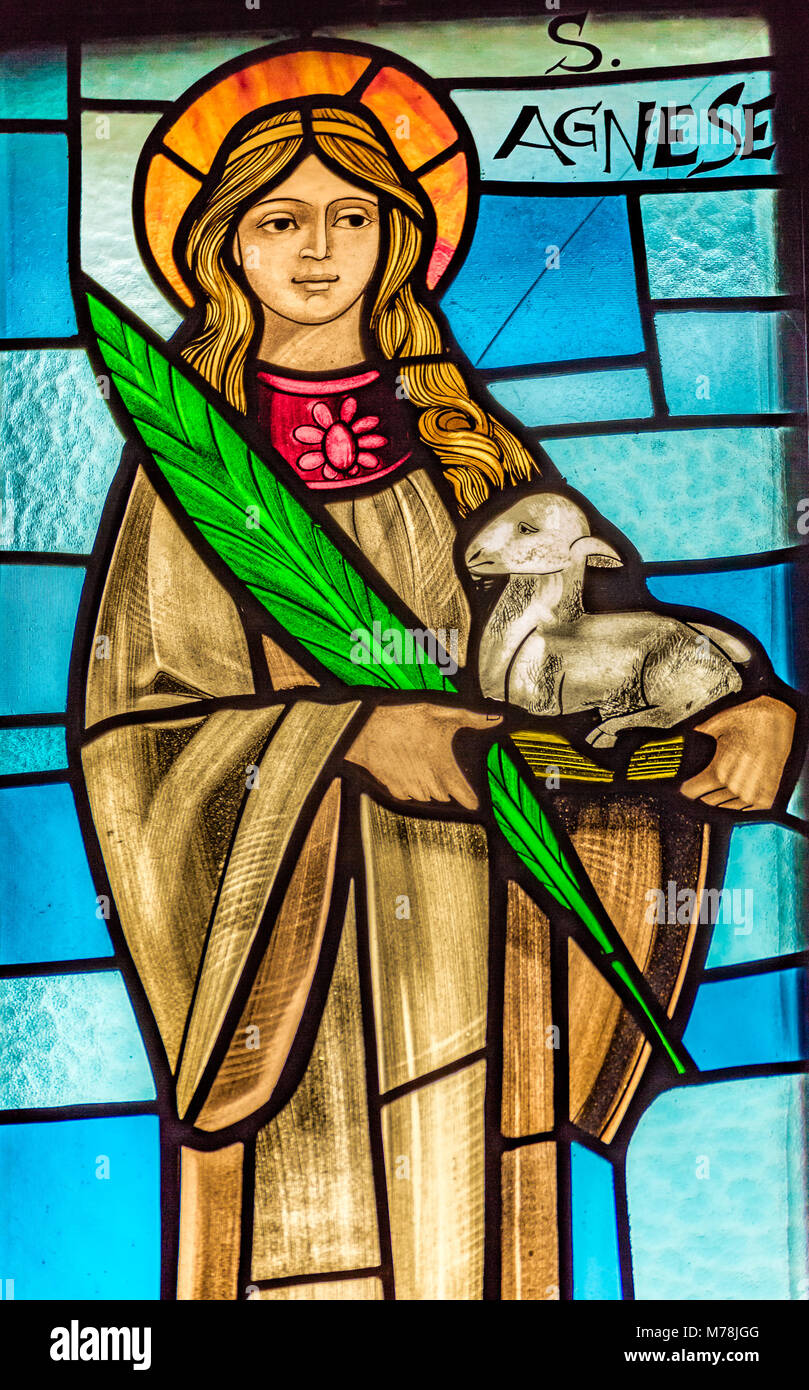 LUGO (RA) - FEBRUARY, 21 2018: Saint Agnes holding lamb in a stained ...