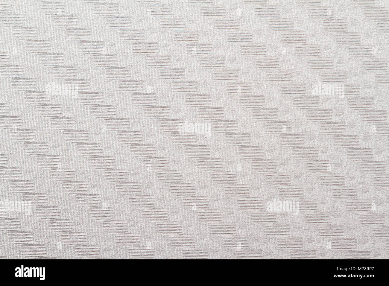 horizontal front view of flat white paper texture with embossed ...