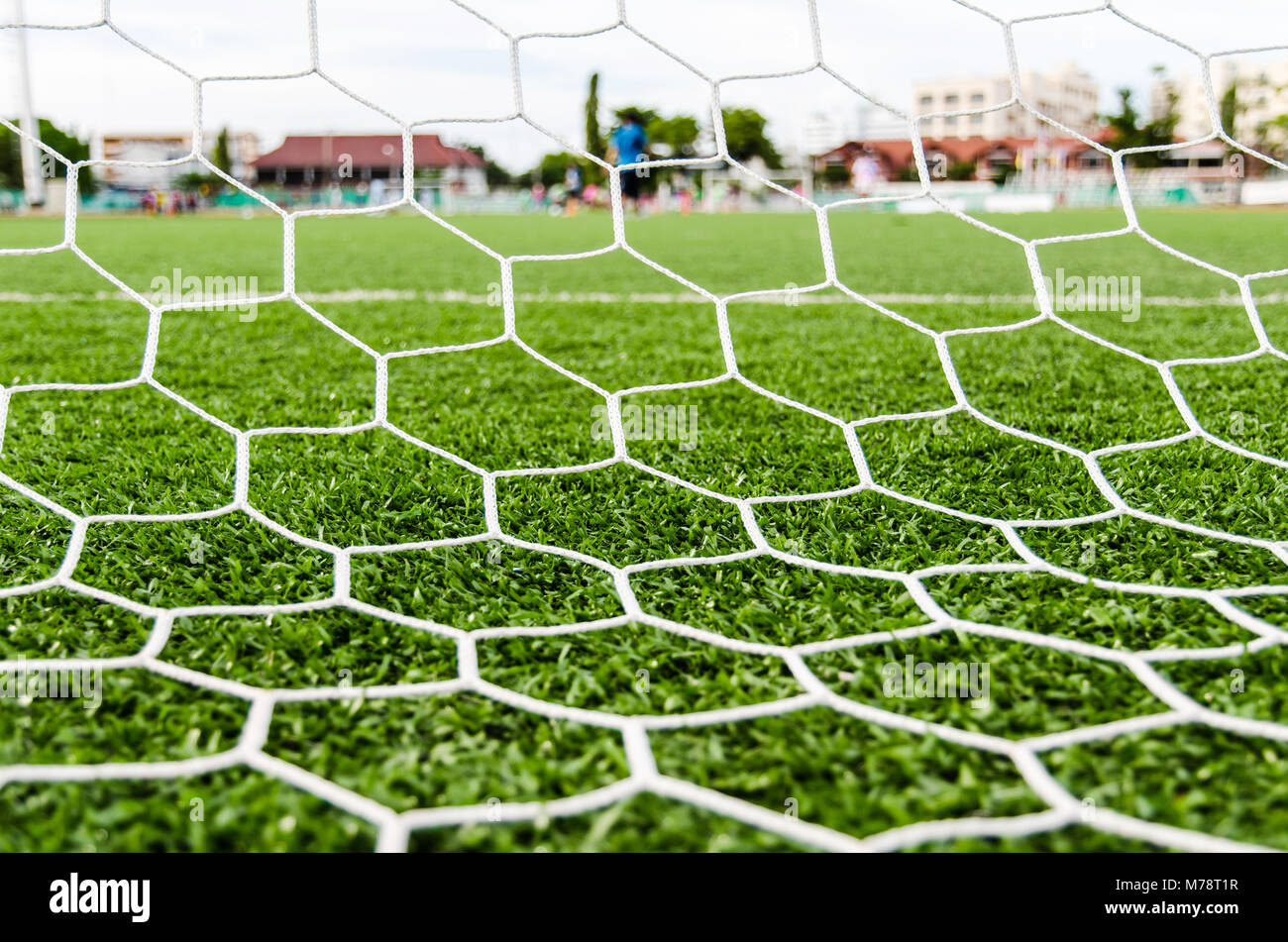 Soccer field with net texture background Stock Photo - Alamy