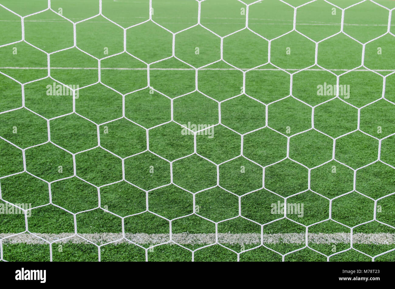 Soccer field with net texture background Stock Photo - Alamy