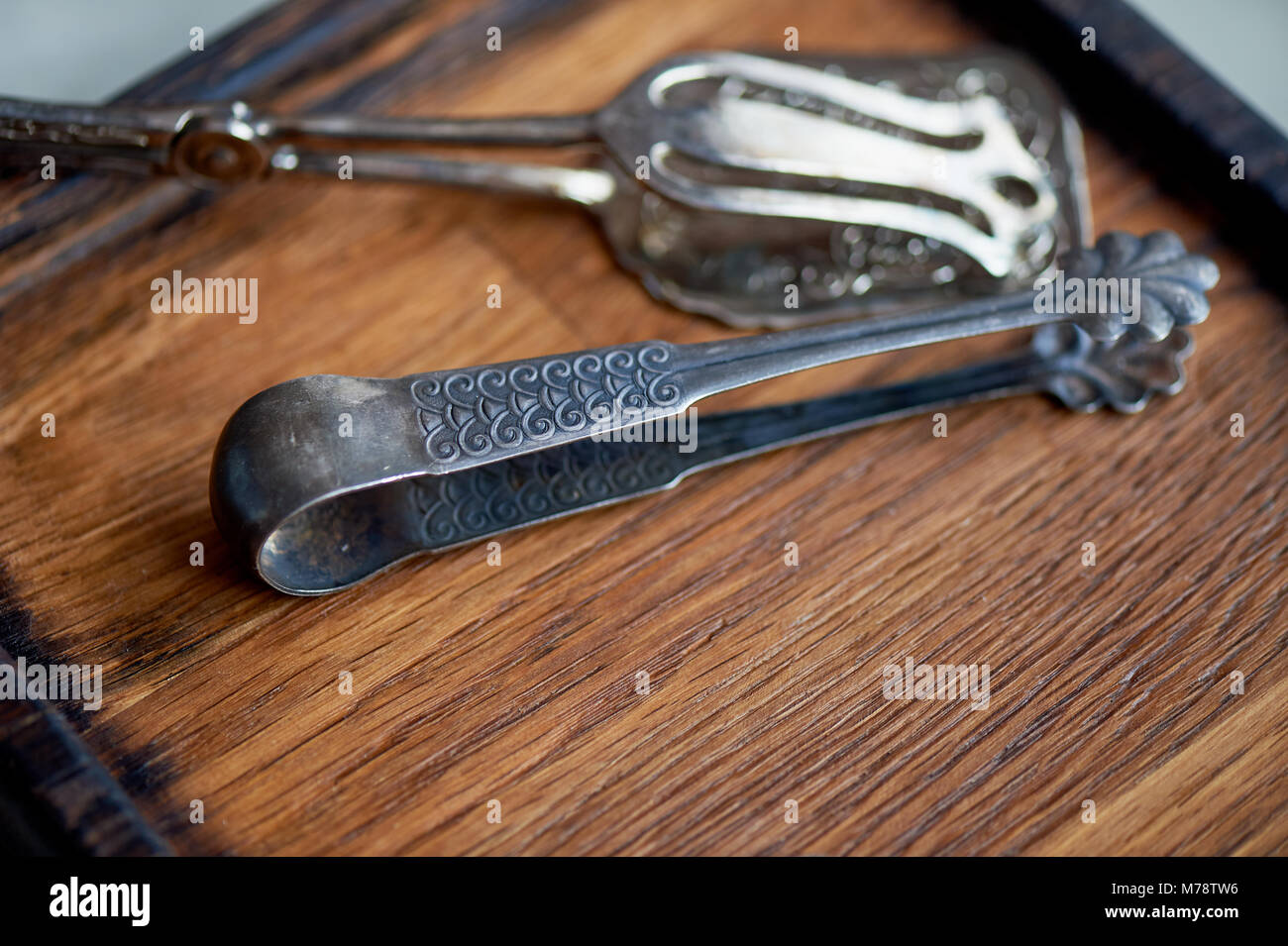 Antique sugar tongs hi-res stock photography and images - Alamy
