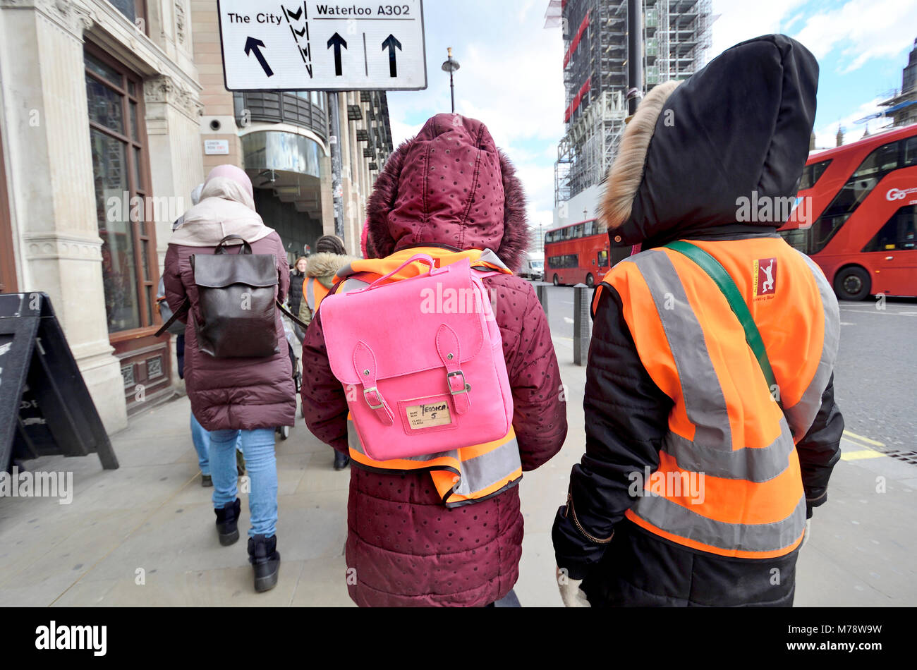London, England, UK. Primary school children with hi-vis jackets on a ...