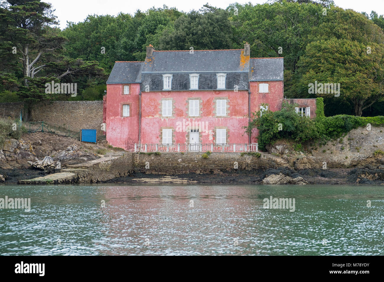 pink house Séné Morbihan france Stock Photo - Alamy