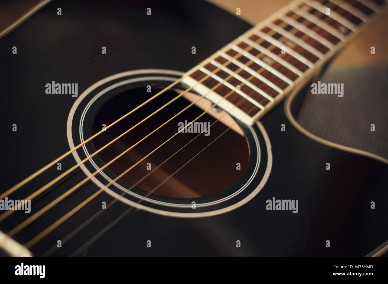 details of black acoustic guitar close up Stock Photo - Alamy