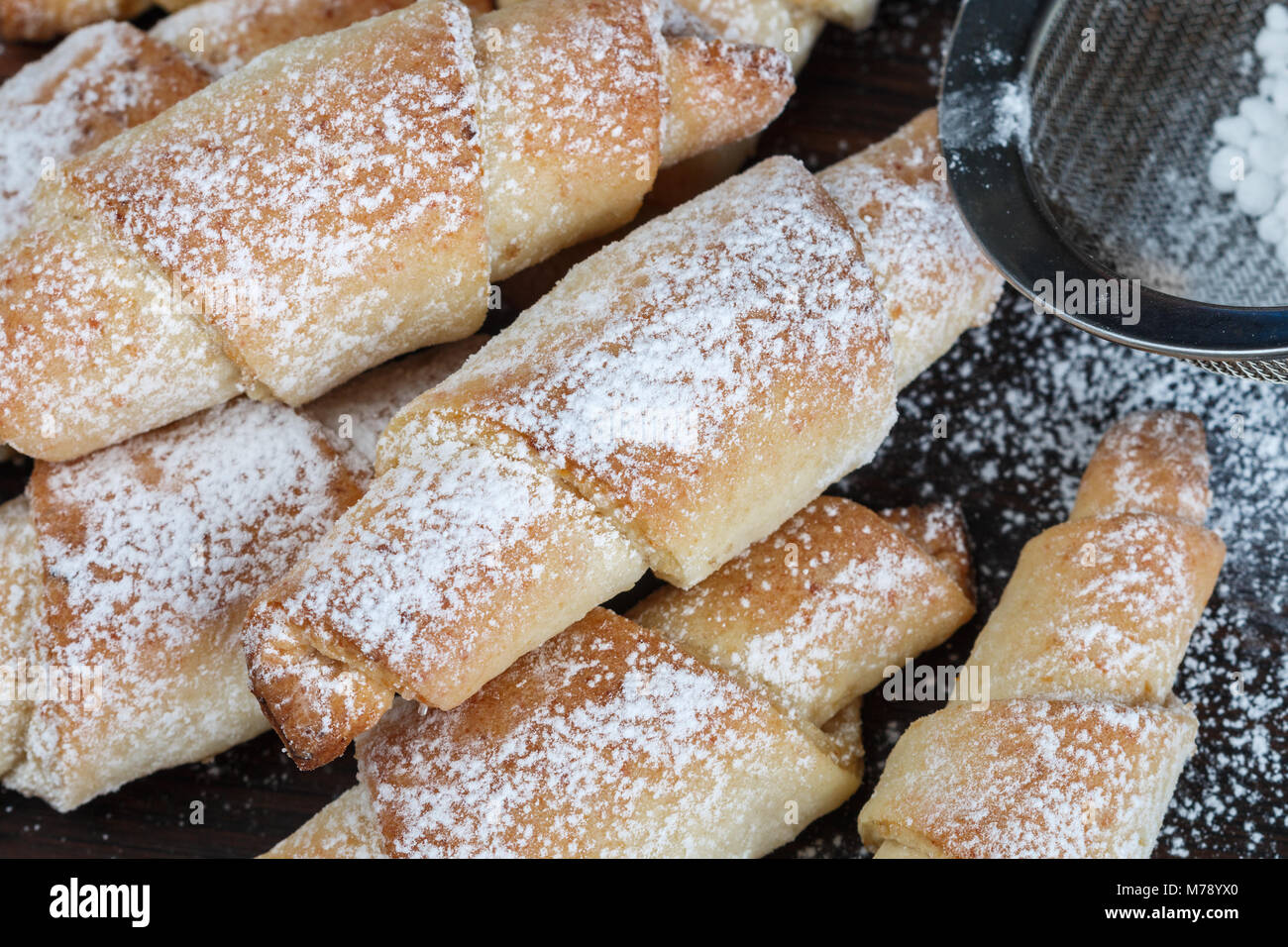 Rugelach with powdered sugar - a traditional European pastry. Dessert ...