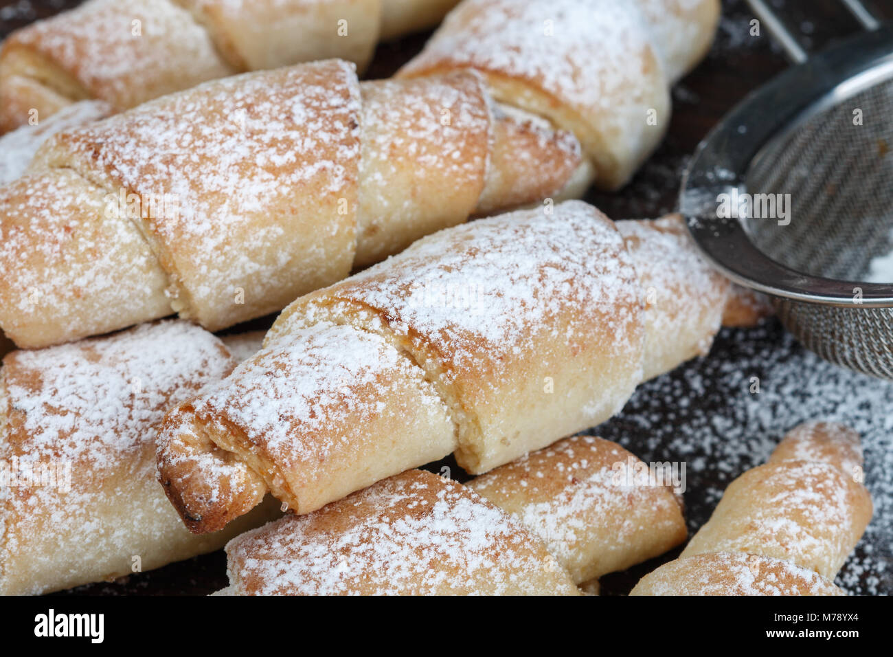 Rugelach with powdered sugar - a traditional European pastry. Dessert ...