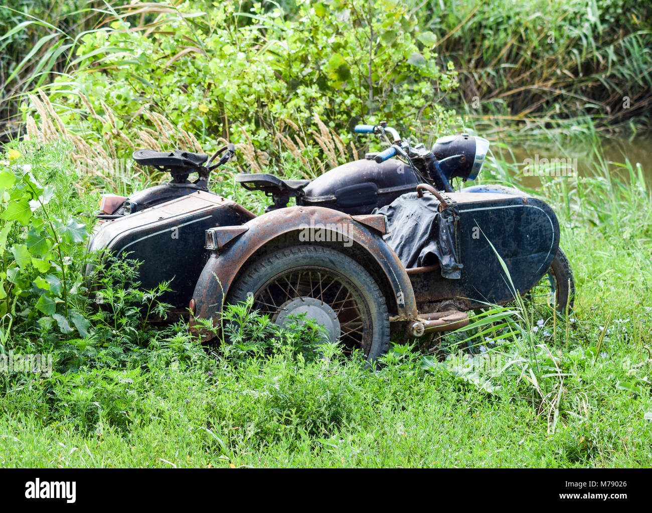 Old Soviet motorcycle with a cradle. An old moto technique Stock Photo ...