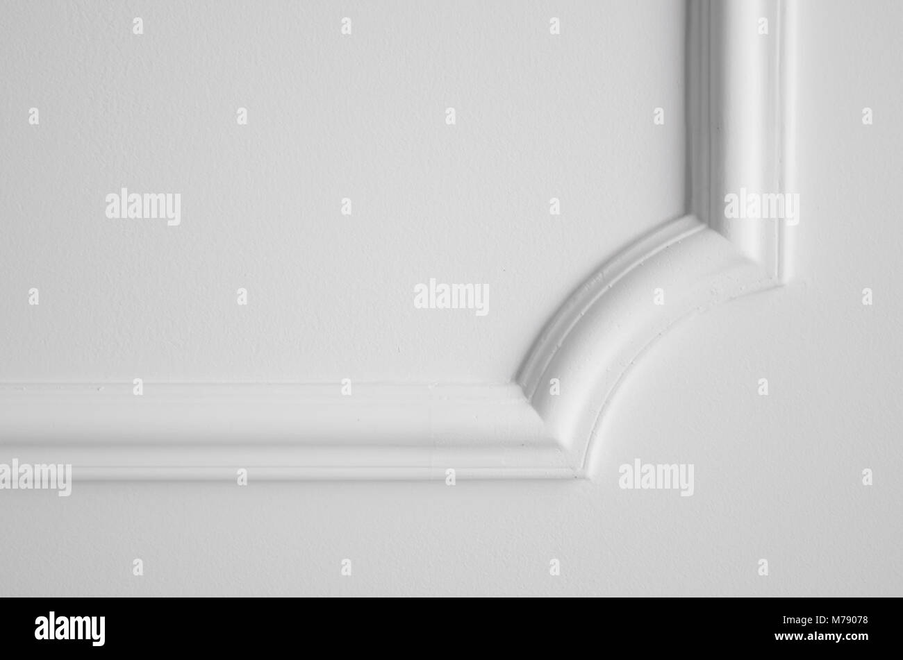 Decorative item made of white plaster on ceiling. Relief stucco ...