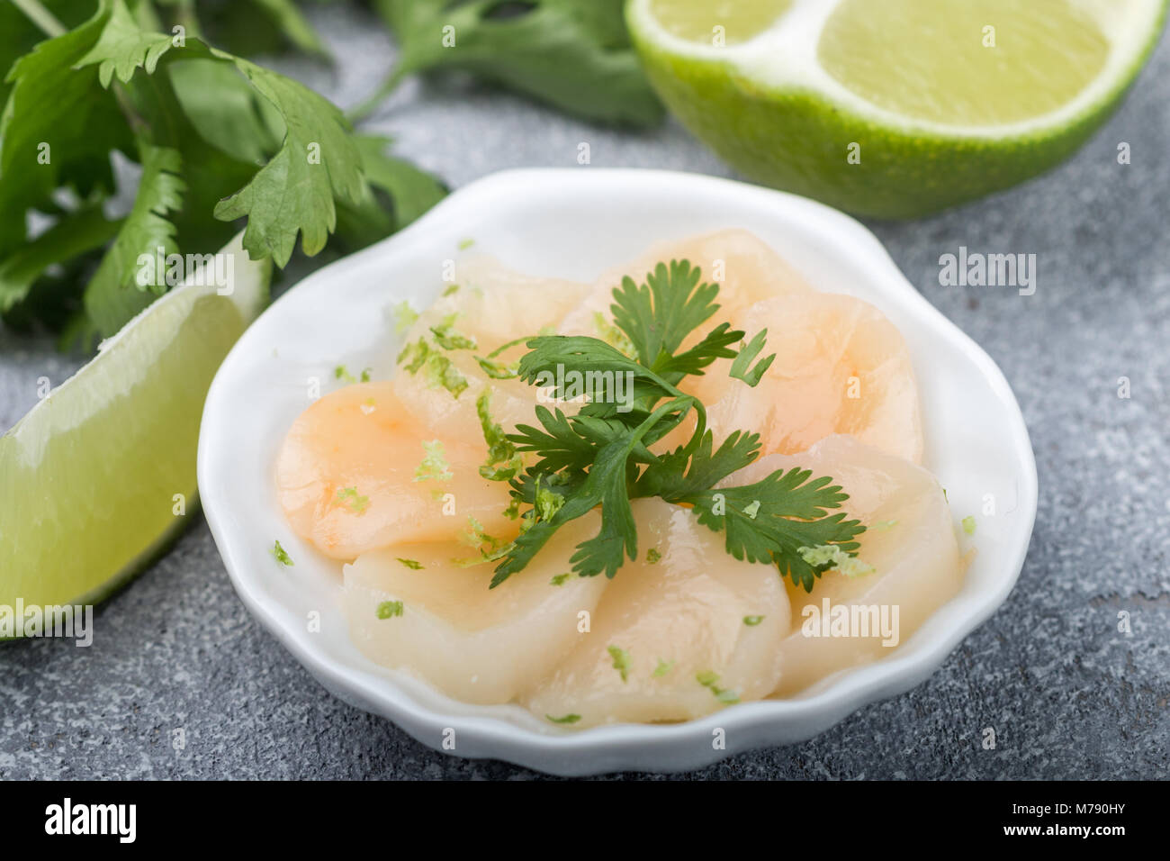 Scallops with lime and cilantro. Delicious appetizer of seafood ...