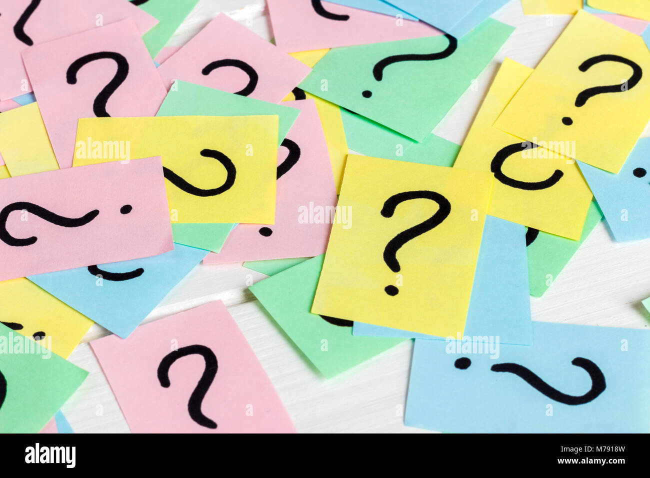 Just a lot of question marks on colored papers Stock Photo - Alamy