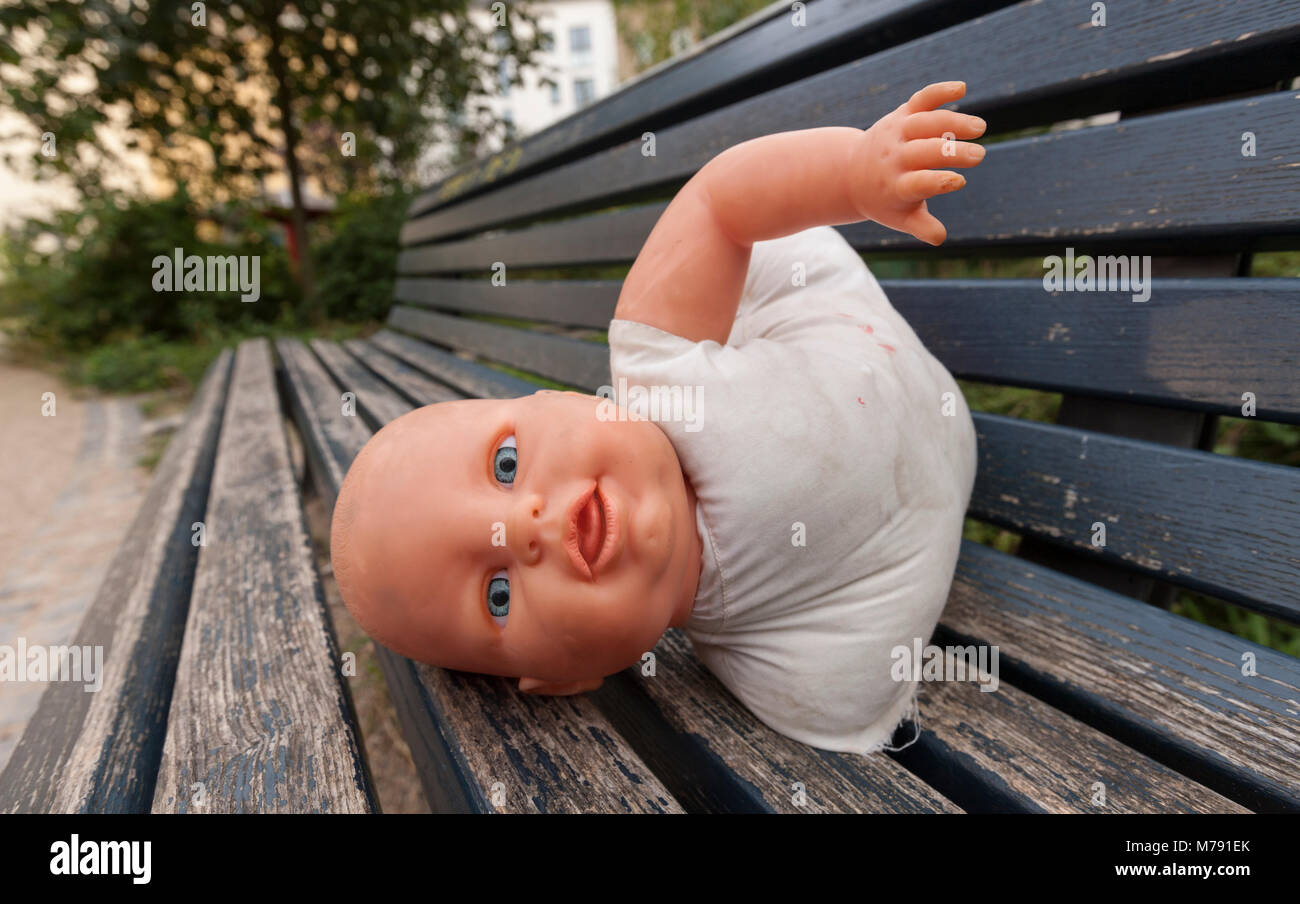 Broken Puppet on Park Bench Stock Photo - Alamy