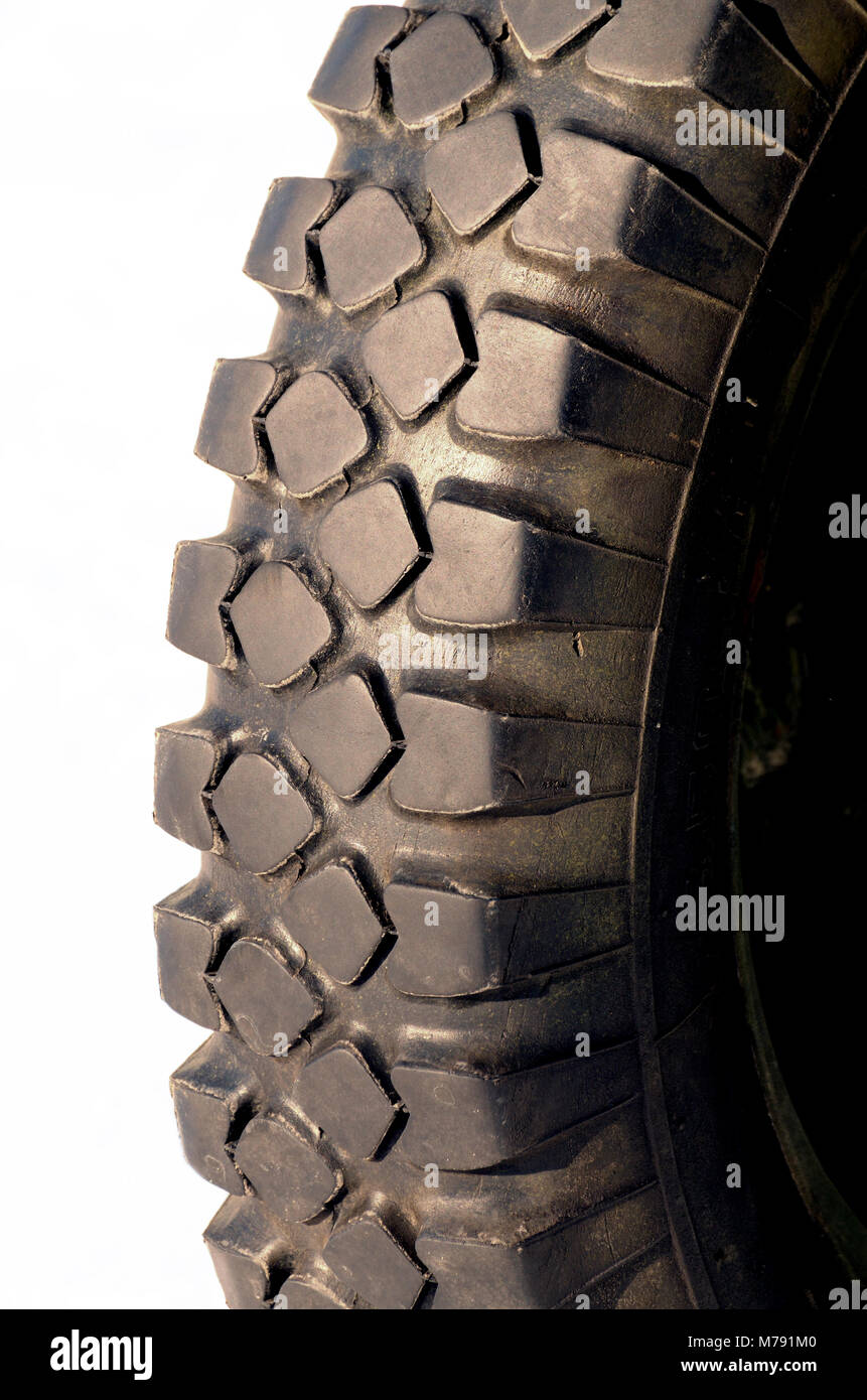 Rubber car tyre on white background.With a pronounced texture Stock ...