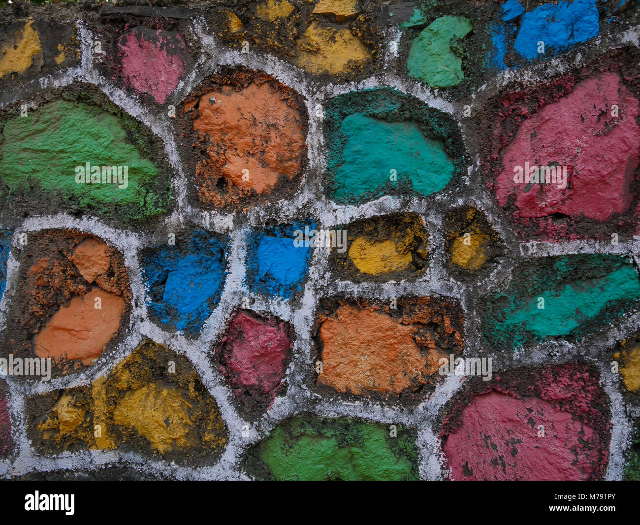 Colored stone wall Stock Photo - Alamy