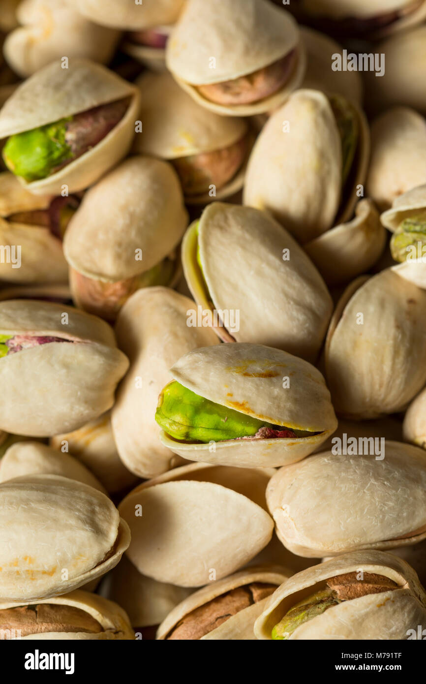 Raw Organic Green Fresh Pistachios in a Bowl Stock Photo - Alamy