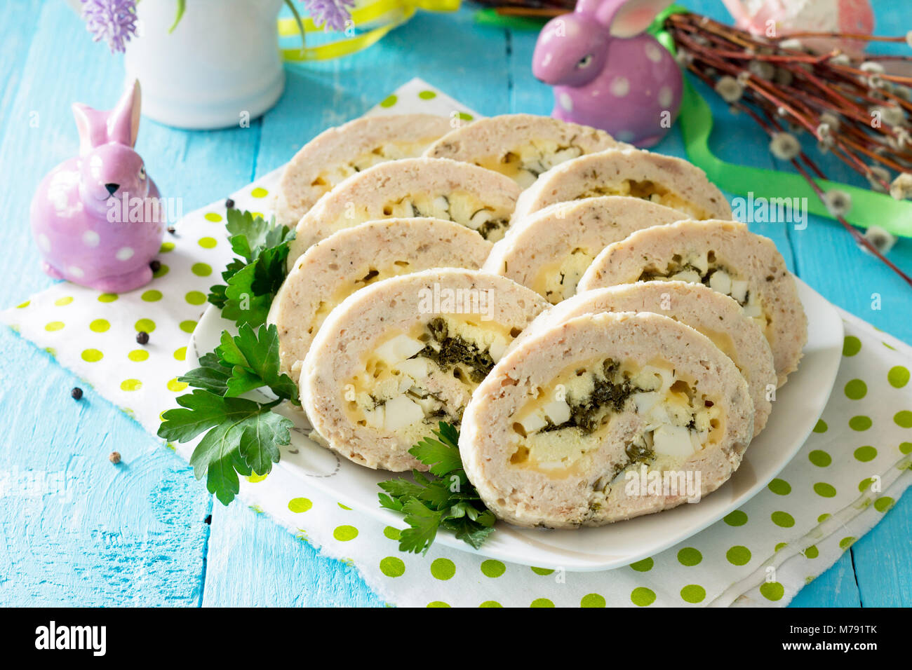 Easter recipe, festive appetizer. Meatloaf with egg, cheese and greens ...