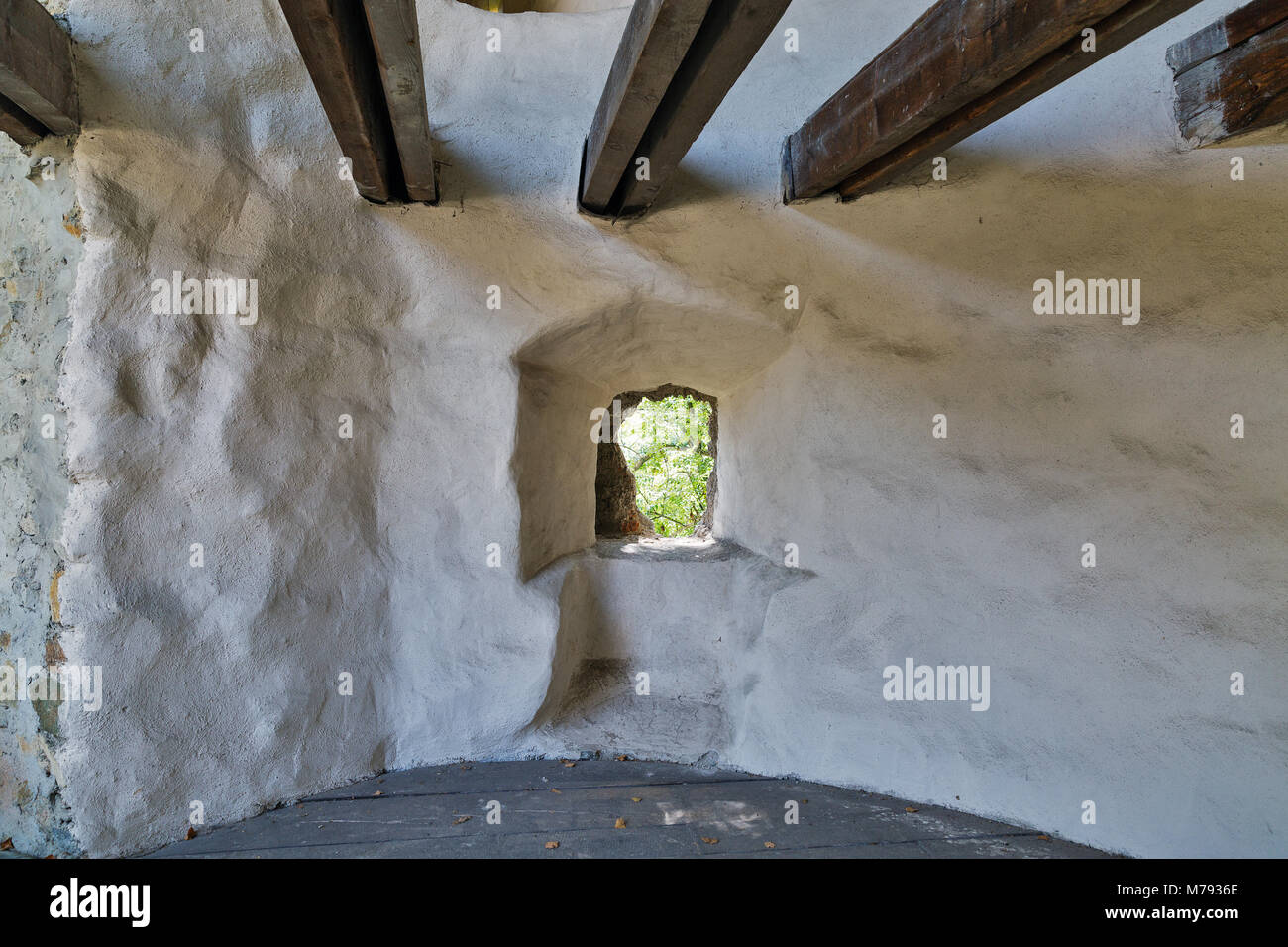 Loophole of medieval castle indoor Stock Photo - Alamy