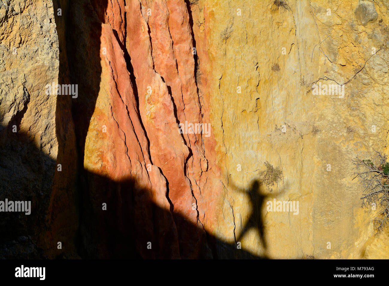 Meditation with Sasha's shadow reflected on colored rock with nice ...