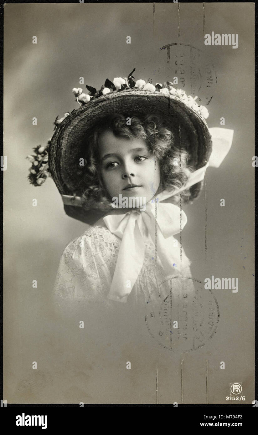 A portrait of Grete Reinwald, wearing a hat. The photo captures her elegant appearance and ...