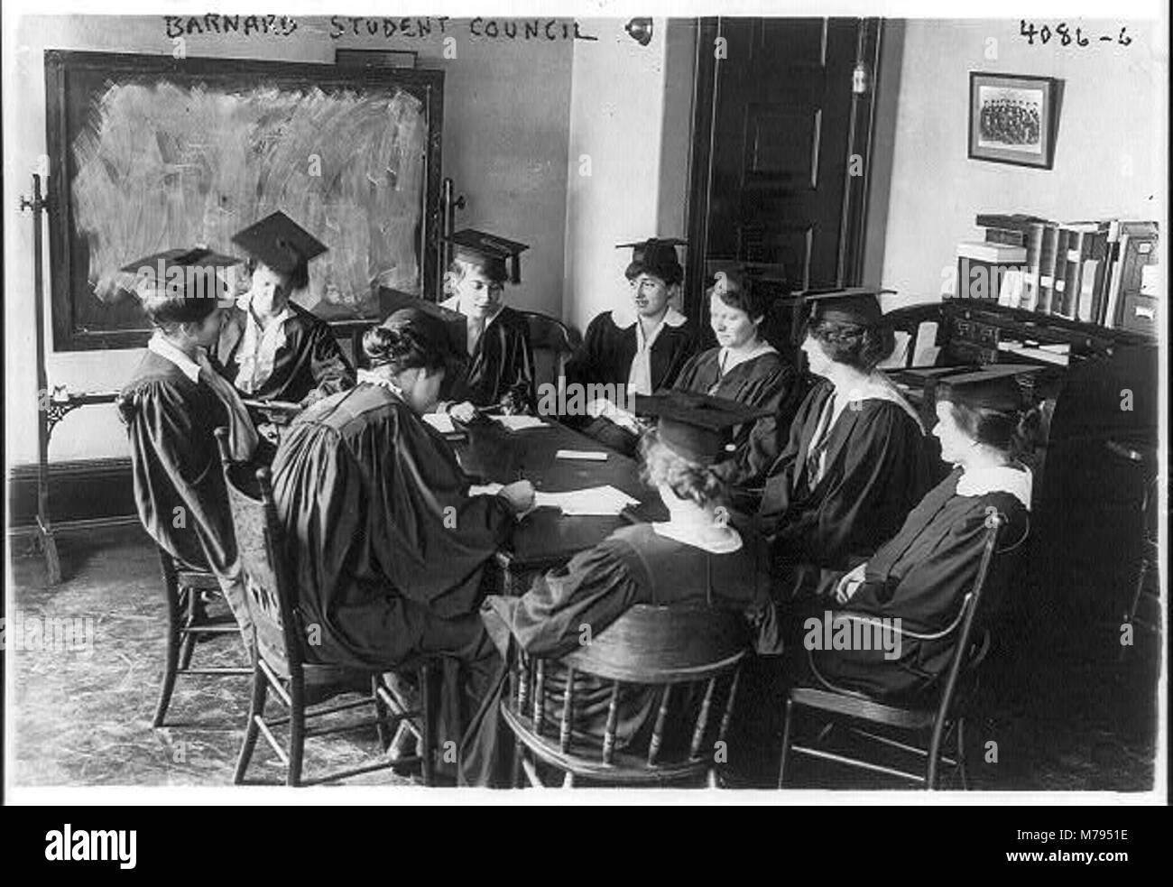 Seated around table hi-res stock photography and images - Alamy