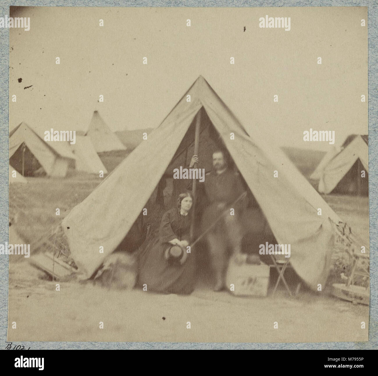 A formal portrait of Captain J. F. Cox, showcasing his role and ...