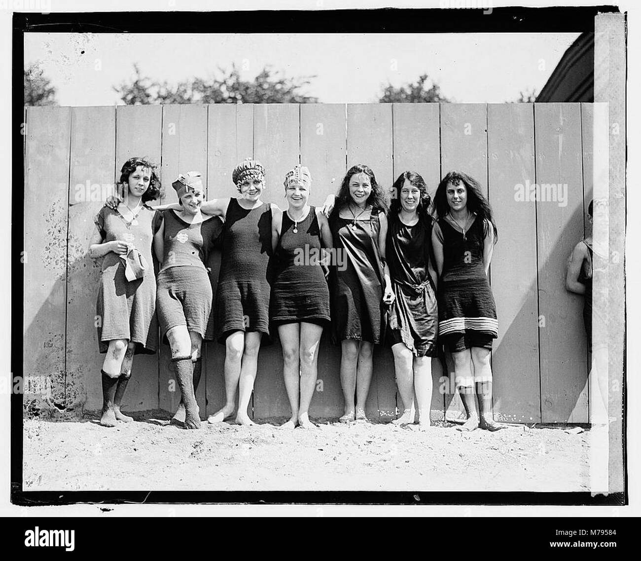 A scene depicting a bathing beach from the year 1920. The image ...