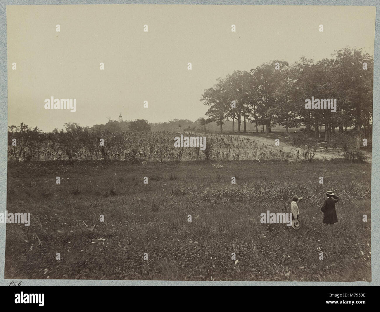 A historical photograph of the Gettysburg battlefield, marking the ...