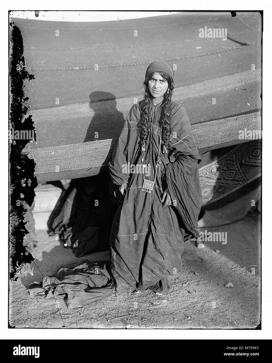 A portrait of a Bedouin woman, capturing the traditional attire and ...