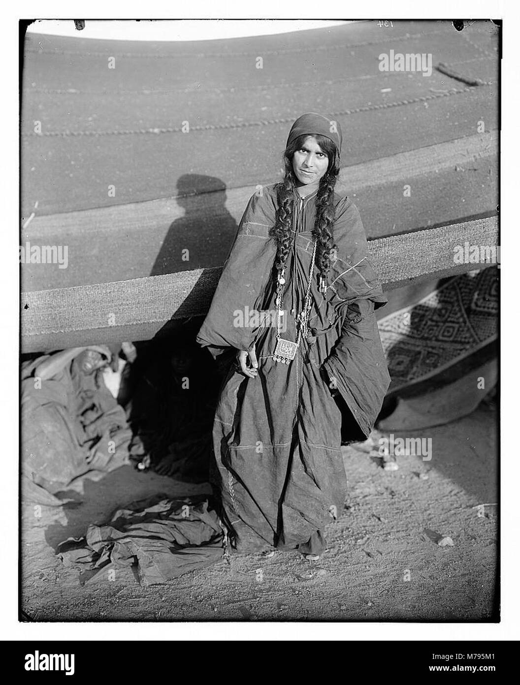 A portrait of a Bedouin woman, showcasing traditional clothing and ...